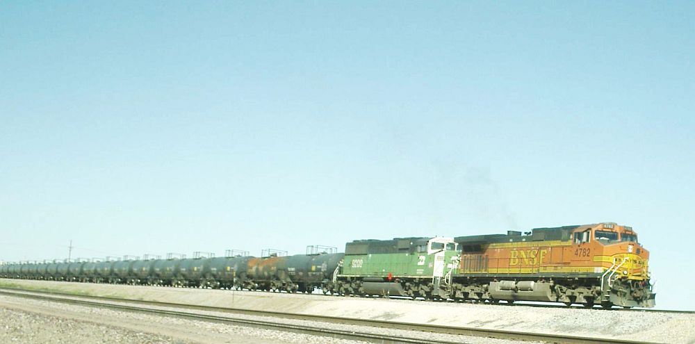 BNSF 4782 and BN 9209 pulling a tank train